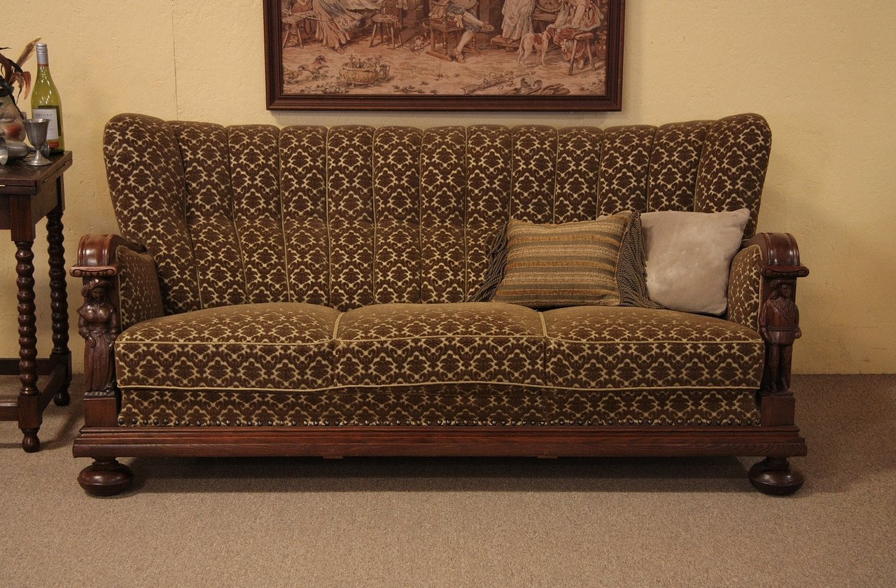 Antique Oak Sofa with Carved Figures