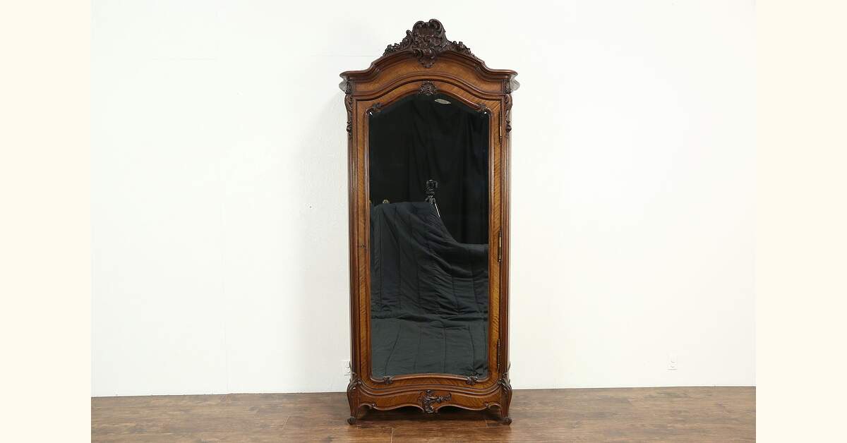 French 1890 Antique Carved Armoire, Wardrobe or Closet, Beveled Mirror